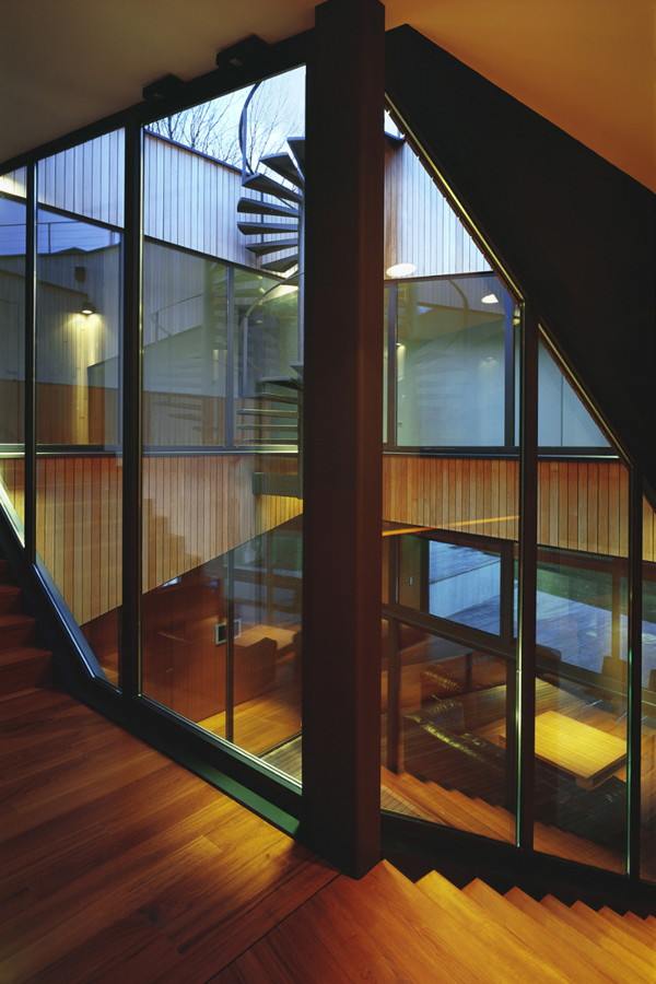 Wood and Glass House in Croatia - Central Atrium with Spiral Staircase